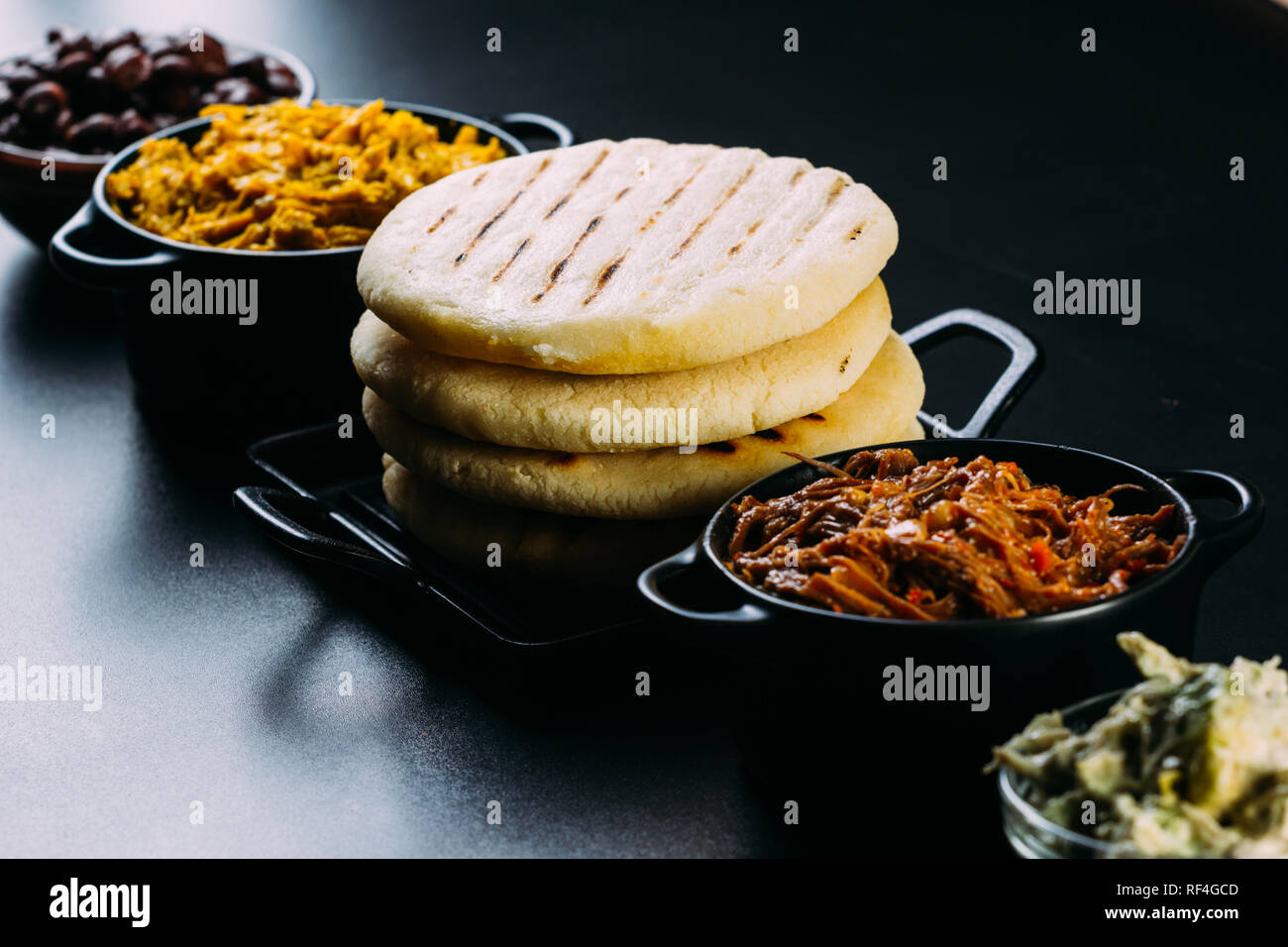 typical breakfast of Venezuela and Colombia, Arepas with many ...