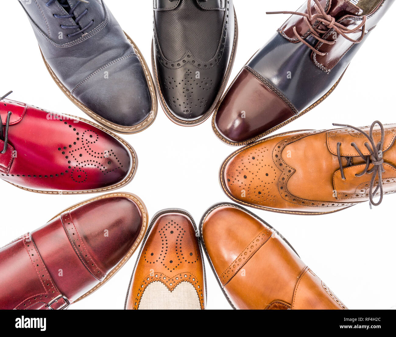 A collection of dress shoes of different colors and kind on an isolated ...