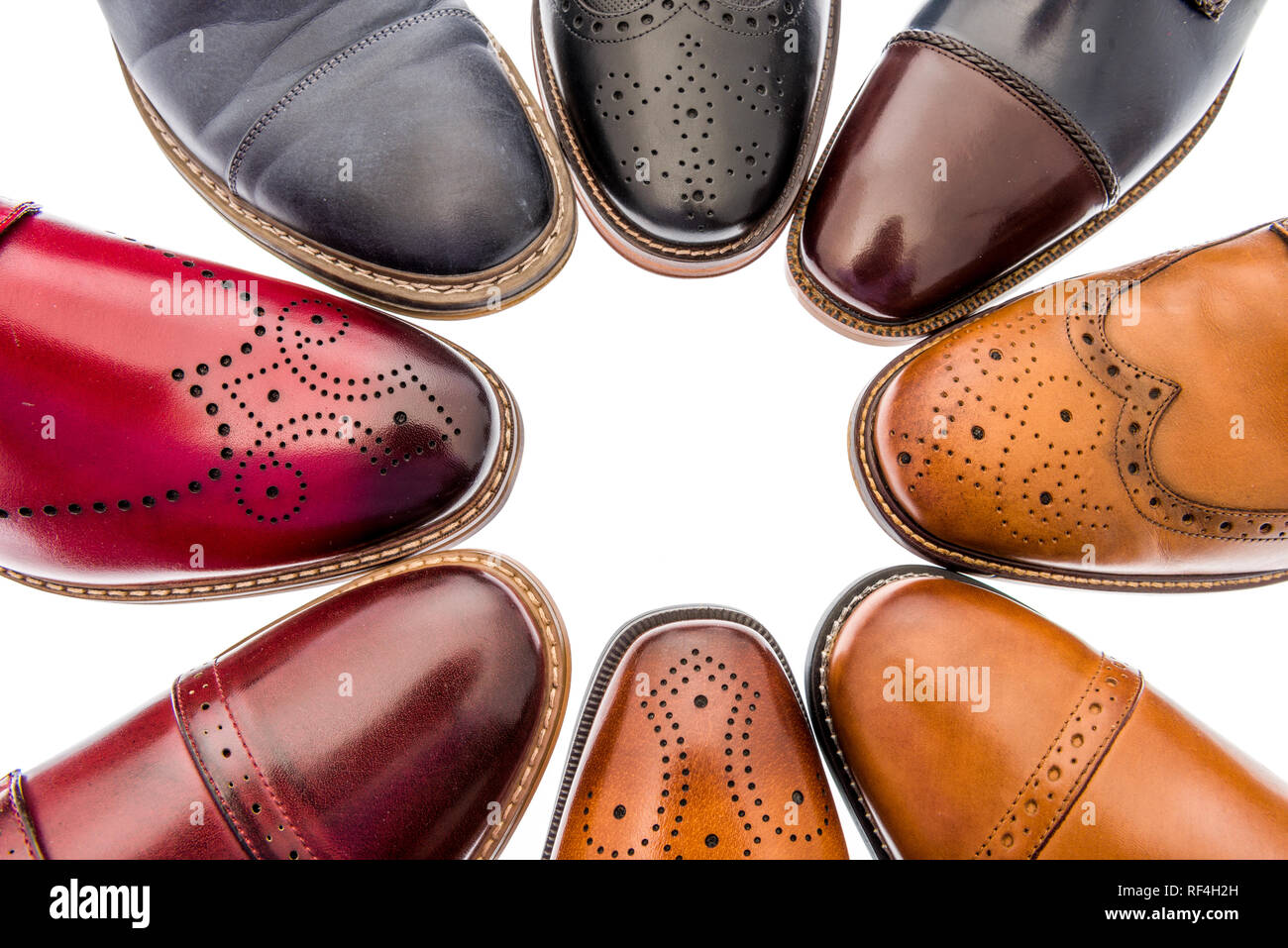 A collection of dress shoes of different colors and kind on an isolated ...