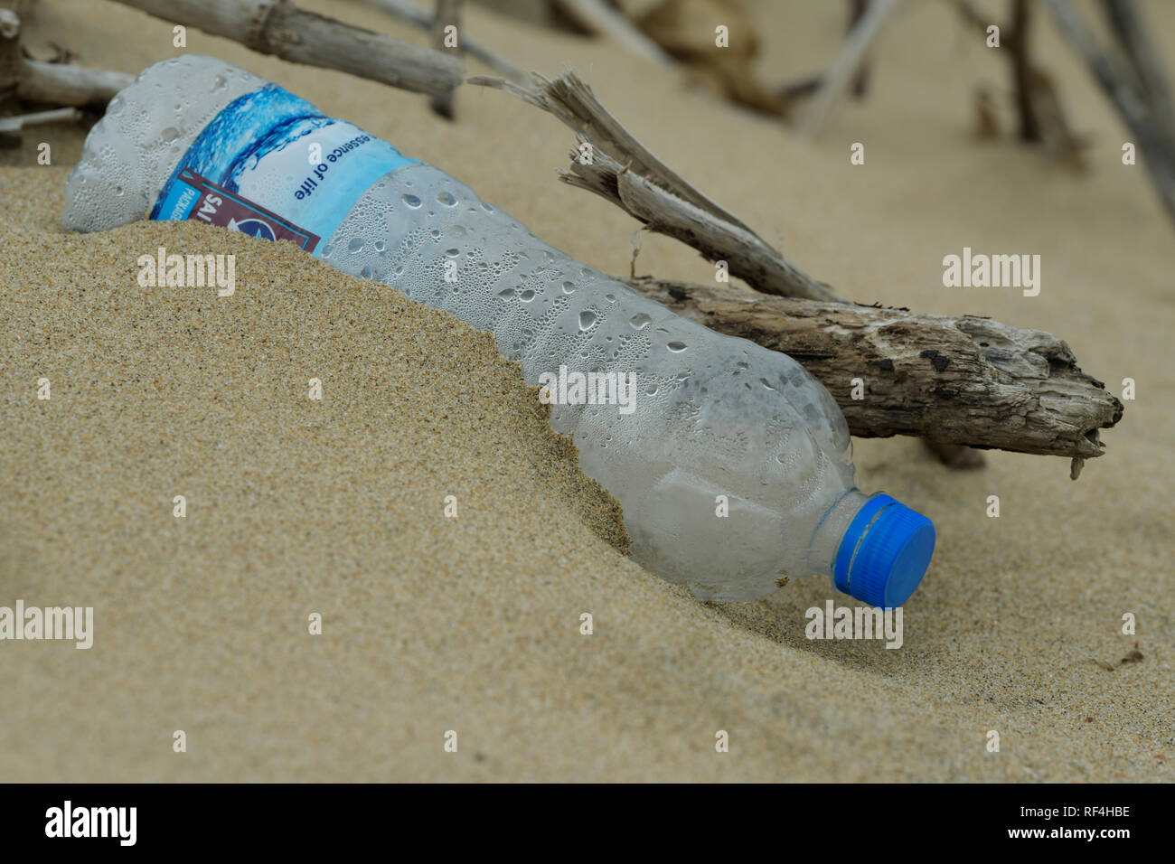 Plastic pollution, close-up, detail, packaging, single empty PET water ...