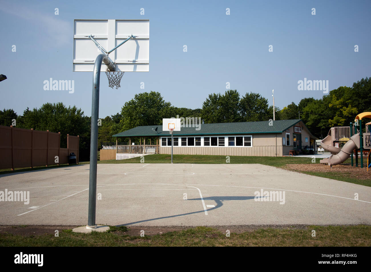 Basketball court at a campground Stock Photo - Alamy