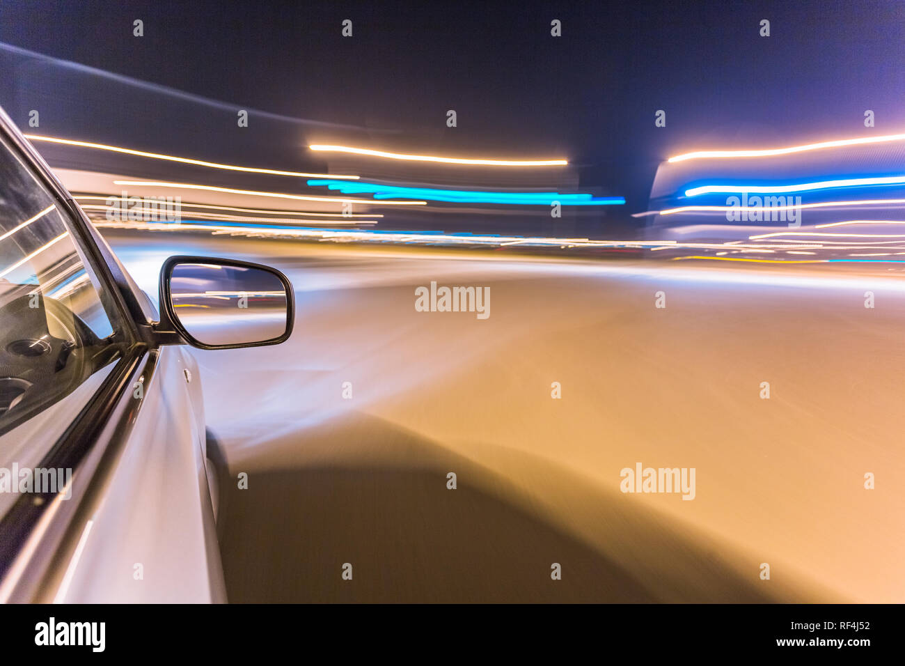 View from Side of Car Going Around Corner, Blurred Motion Stock Photo ...