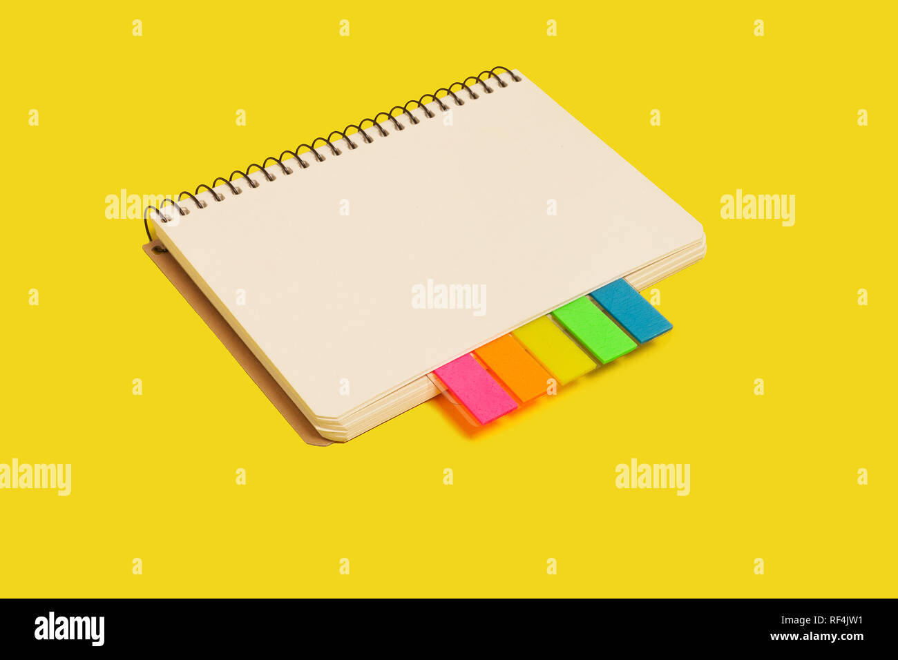 spiral notebook with sticky notes Stock Photo - Alamy