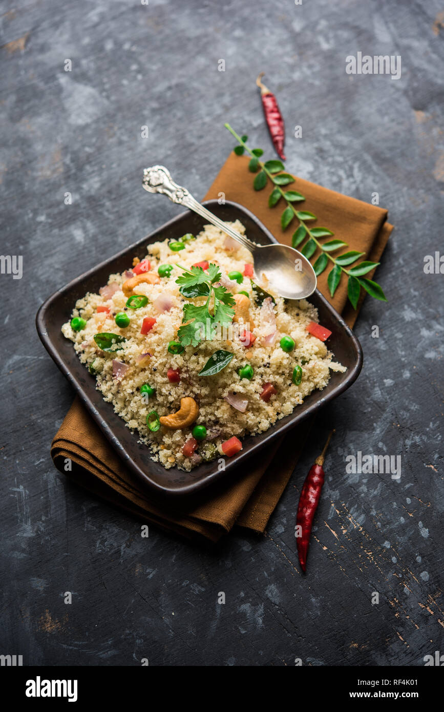 Rava Upma / Uppuma - south indian breakfast served in a bowl. selective ...