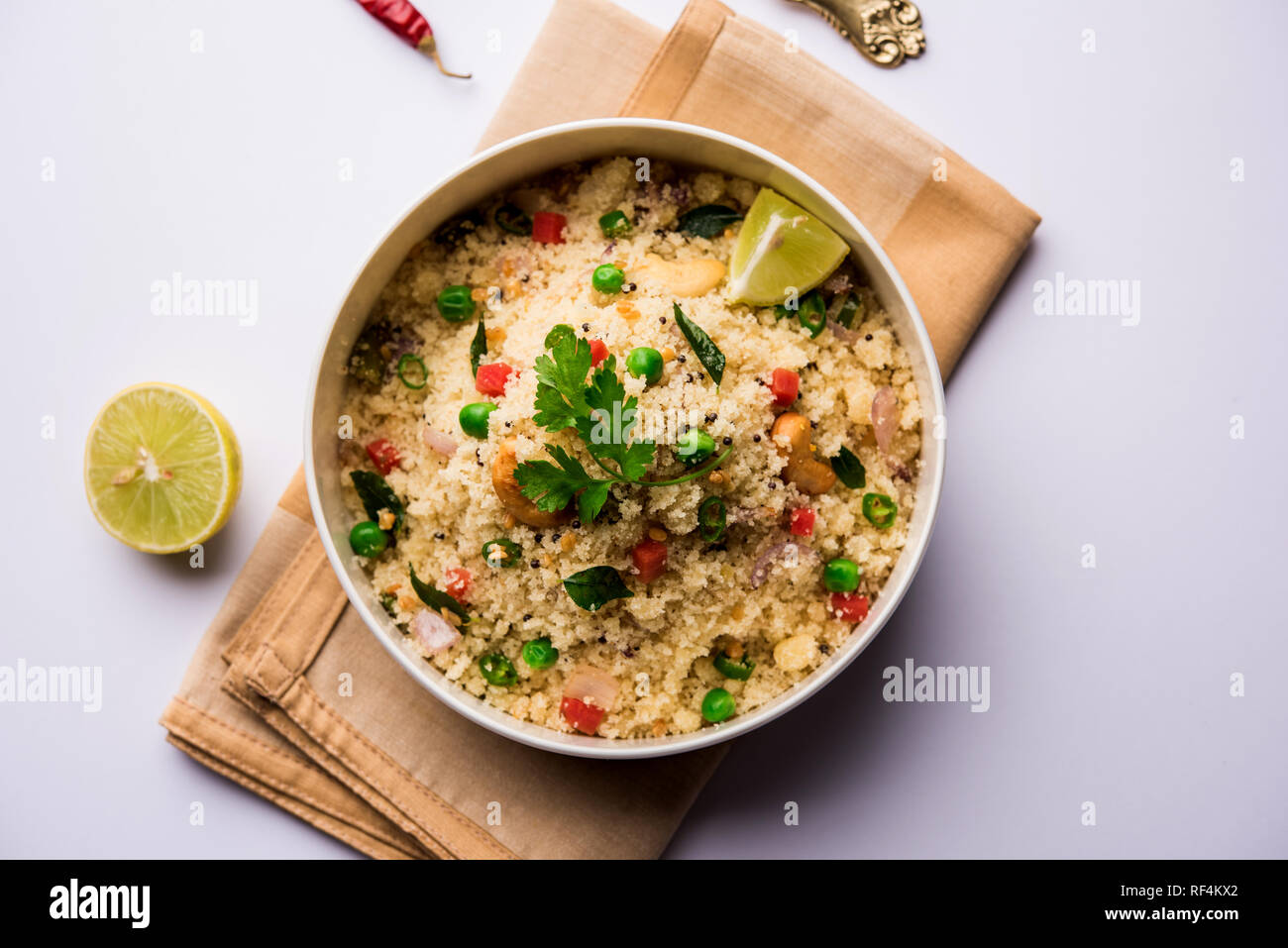 Rava Upma / Uppuma - south indian breakfast served in a bowl. selective ...