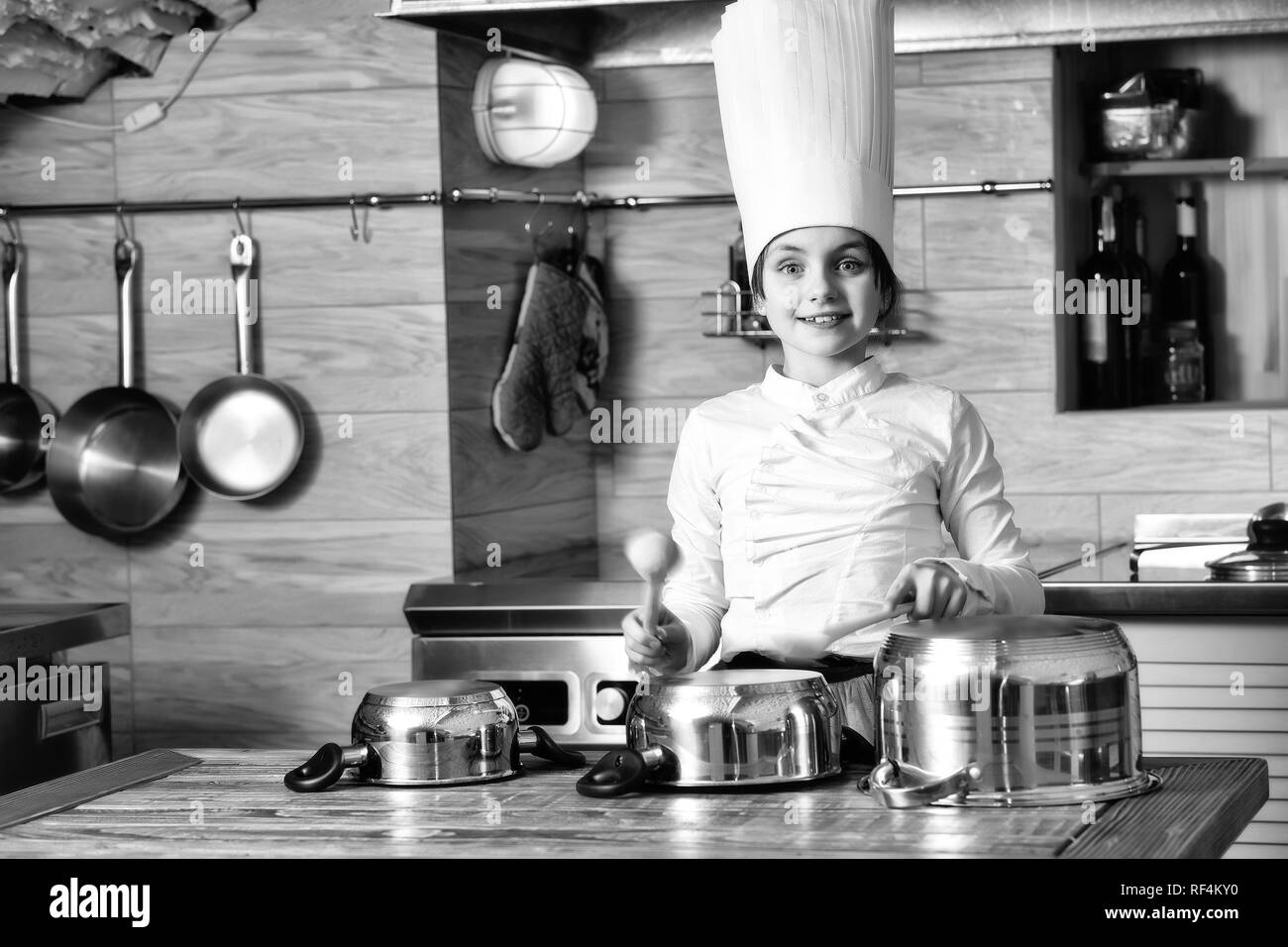 Small girl cooking Stock Photo - Alamy