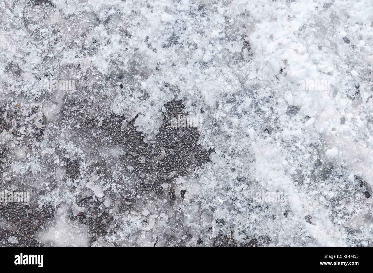 Fresh frozen ice and snow on sidewalk like winter background Stock ...