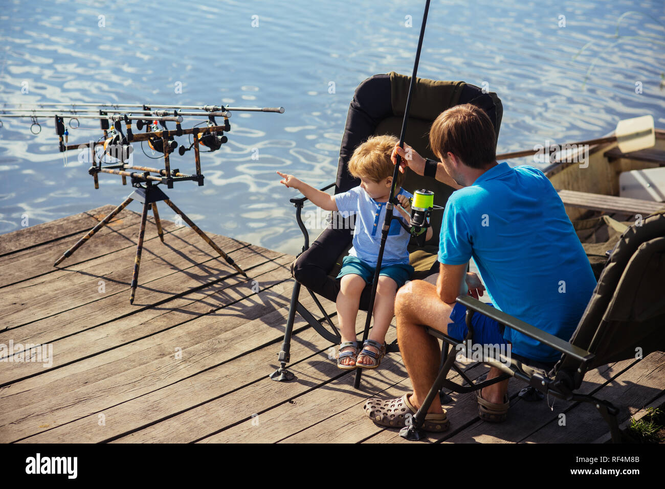 Teach son to fish hi-res stock photography and images - Alamy