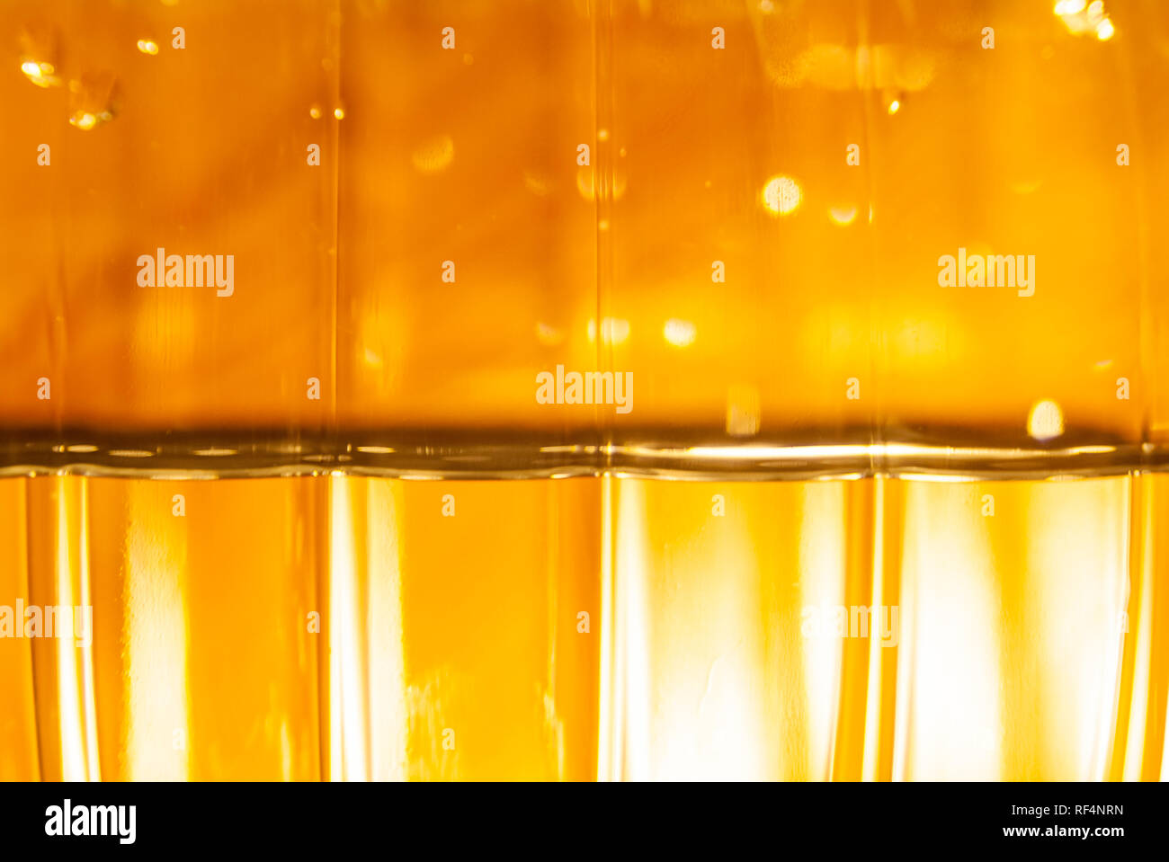 Gold fluid hi-res stock photography and images - Alamy