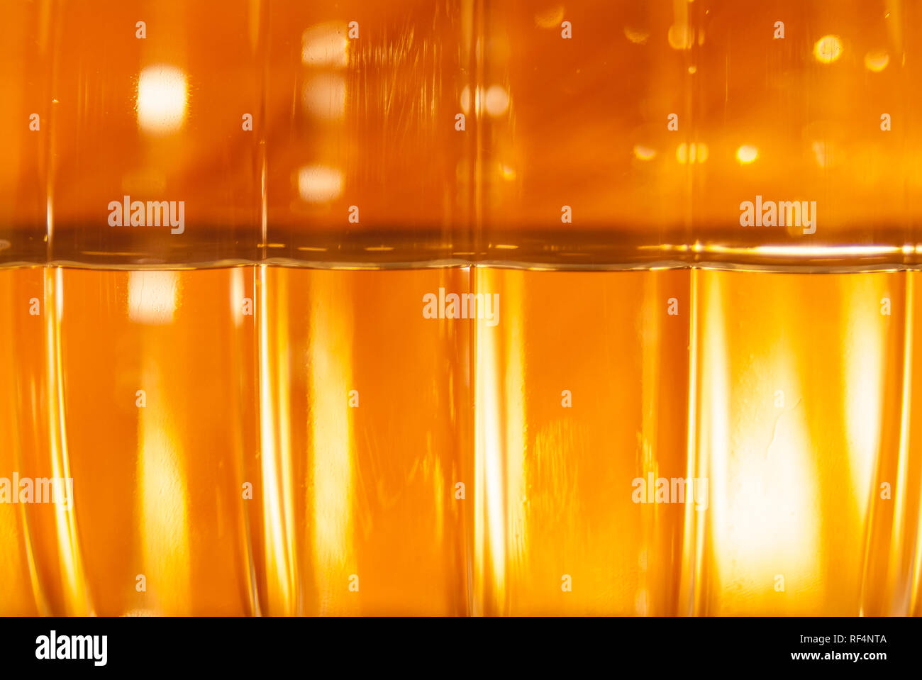 Abstract view of transparent fluid in container, backlit shot Stock ...