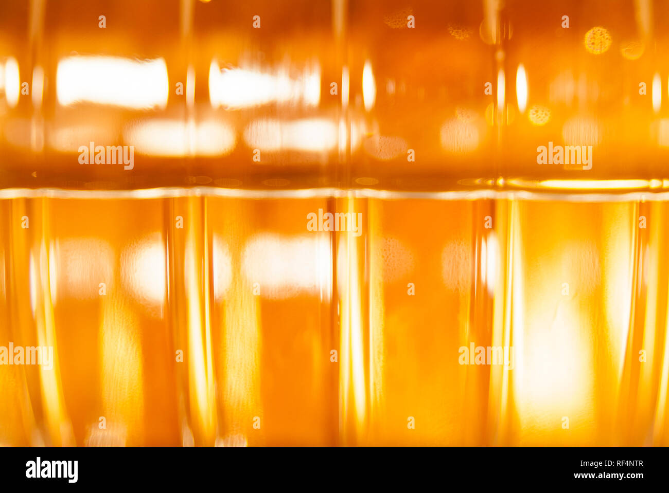 Abstract view of transparent fluid in container, backlit shot Stock ...