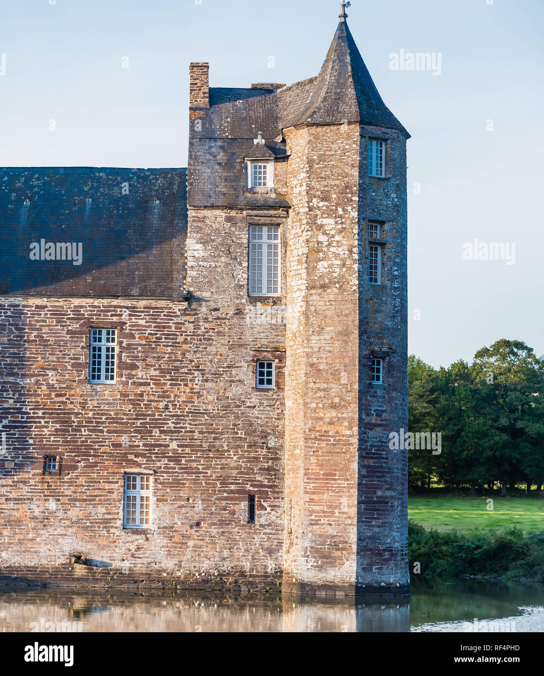 The turrets of the 14th century Chateau de Trecesson in the Forest of ...