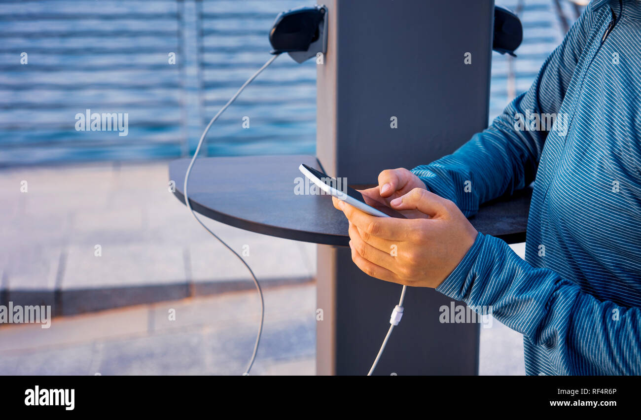 Public mobile phone charging station hi-res stock photography and ...