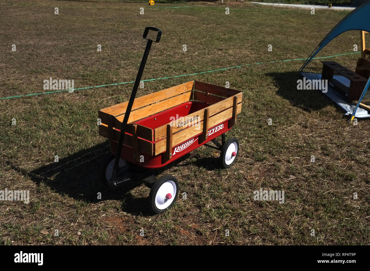 Red painted antique wagon hi-res stock photography and images - Alamy