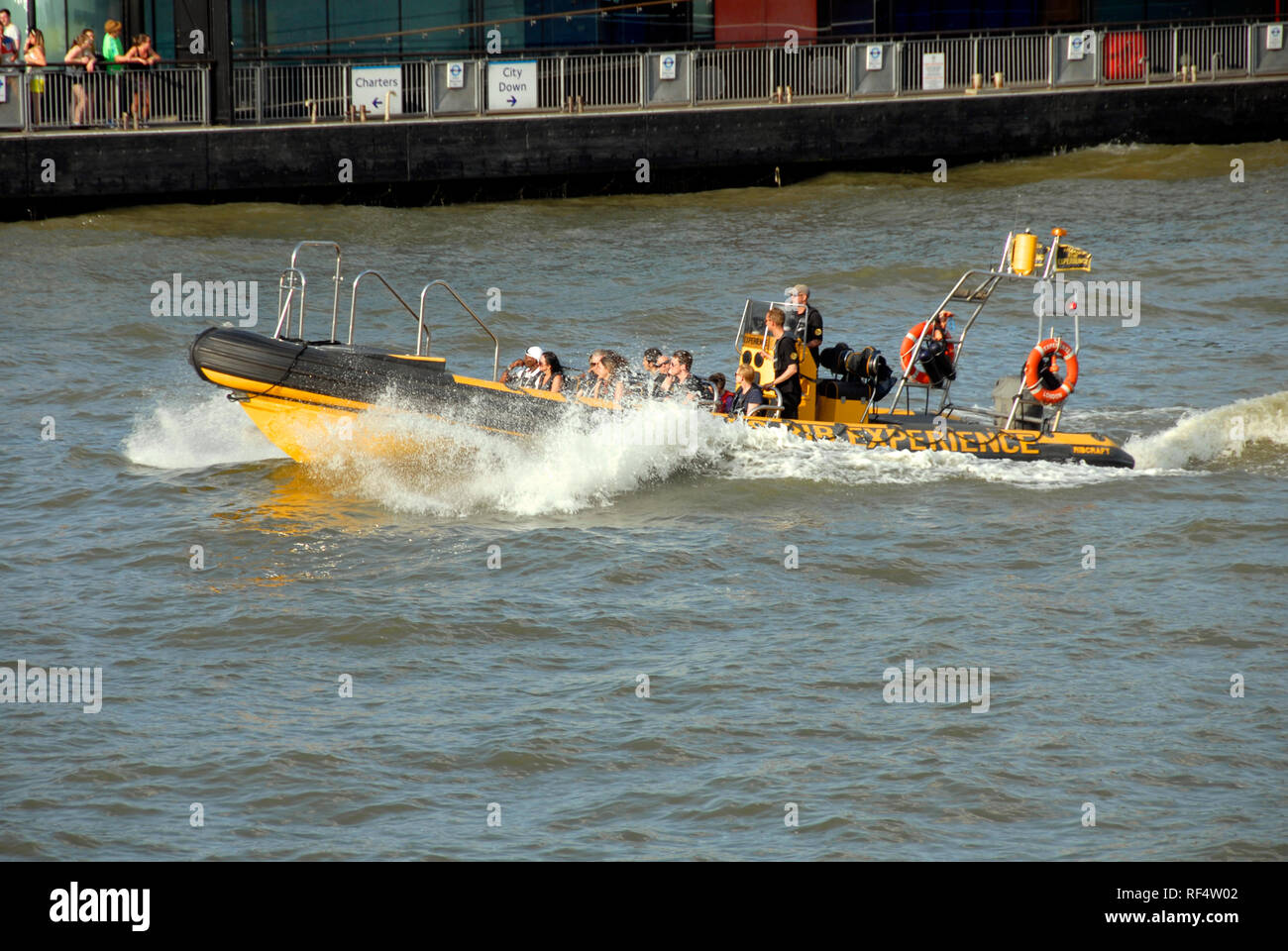 Passengers enjoying a ride in a Thames Rib Experience boat, London ...