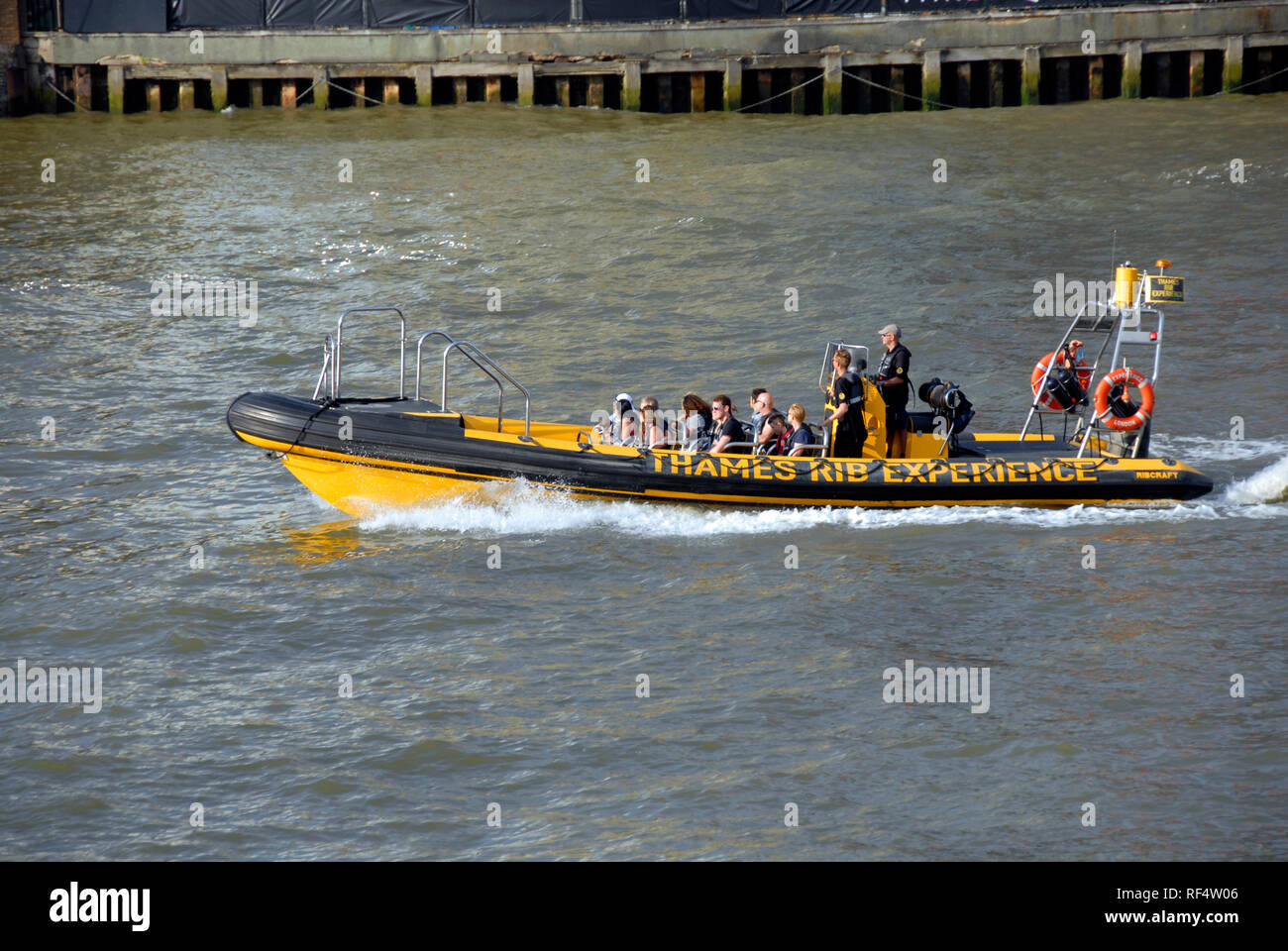 Passengers enjoying a ride in a Thames Rib Experience boat, London ...