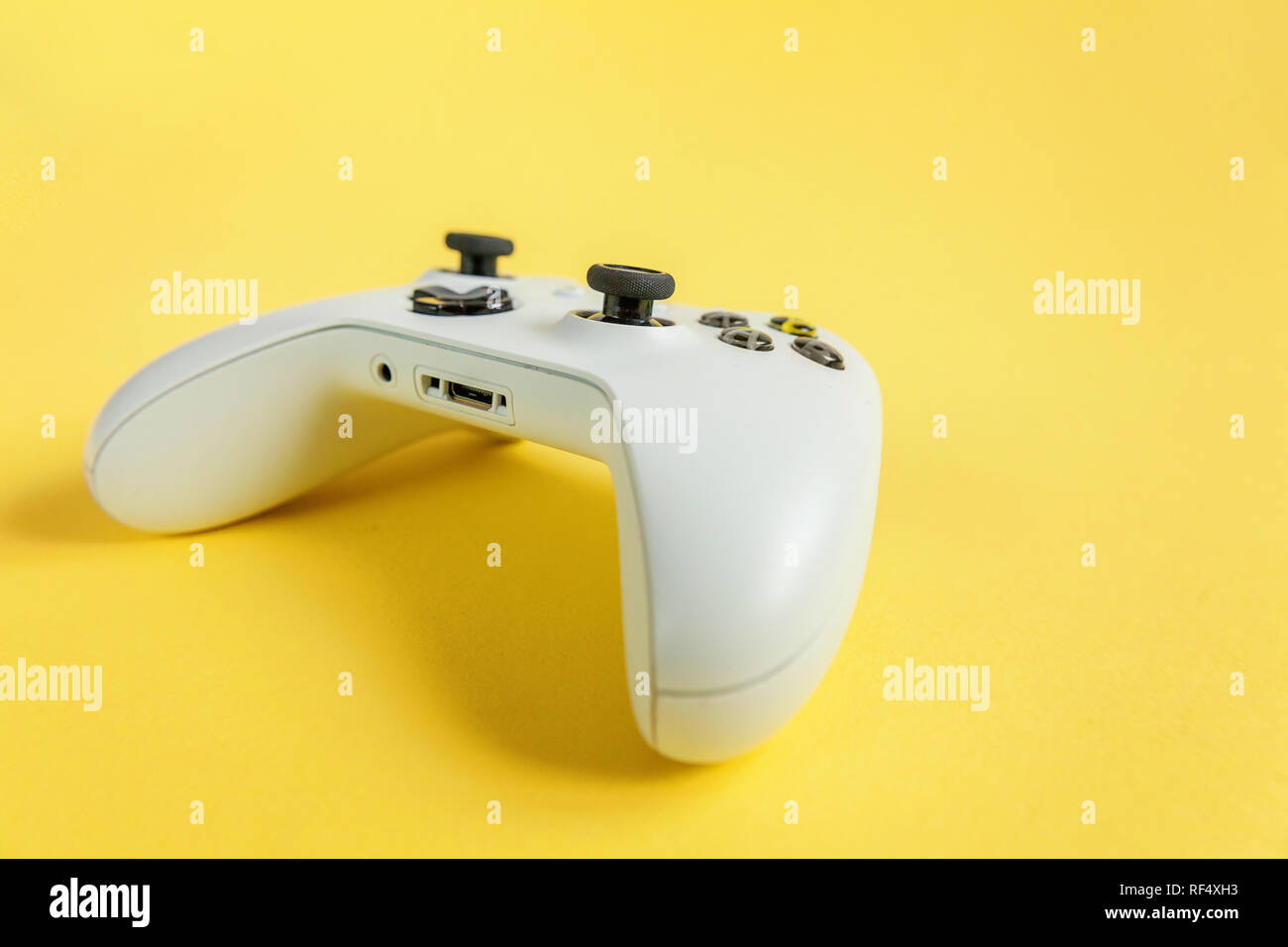 White Joystick Gamepad Game Console On Yellow Colourful Trendy Modern