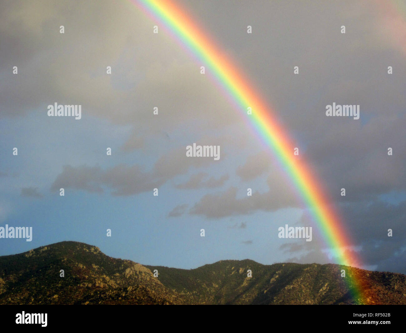 A rainbow appears in Phoenix, Arizona after a rain storm Stock Photo ...