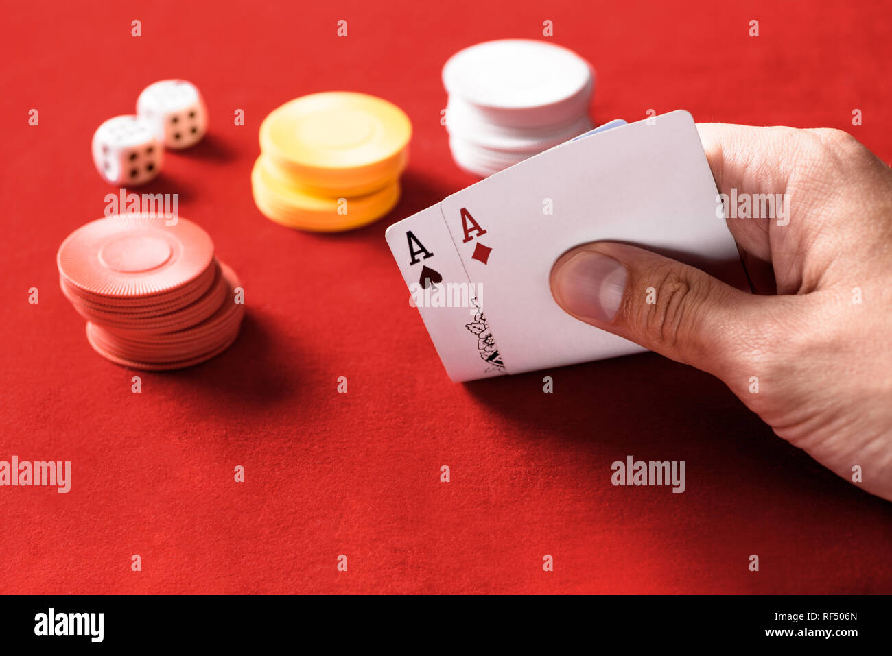 Gambler male hand cards chips hi-res stock photography and images - Alamy