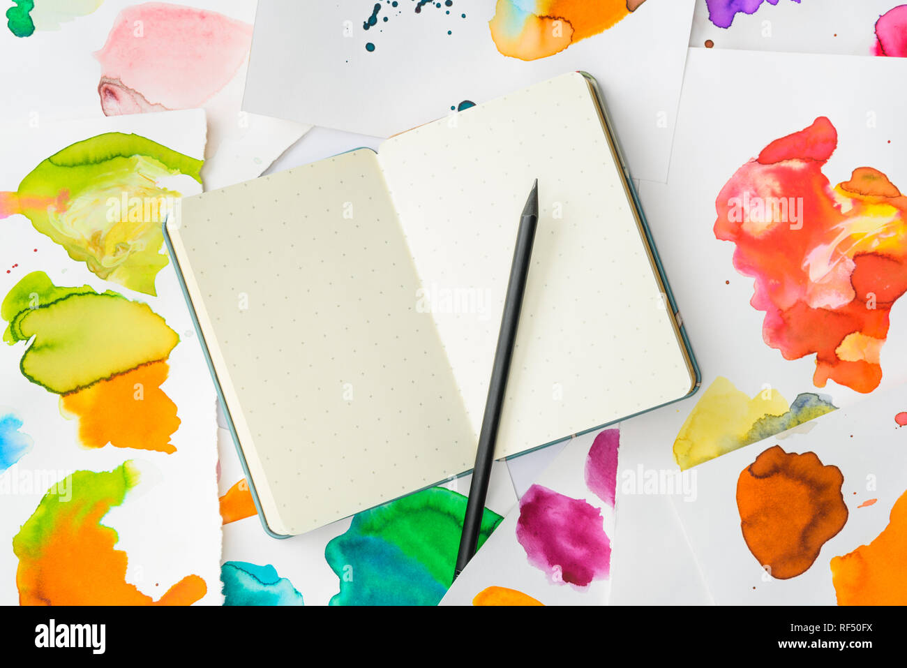 top view of white notebook with pencil on background with abstract ...