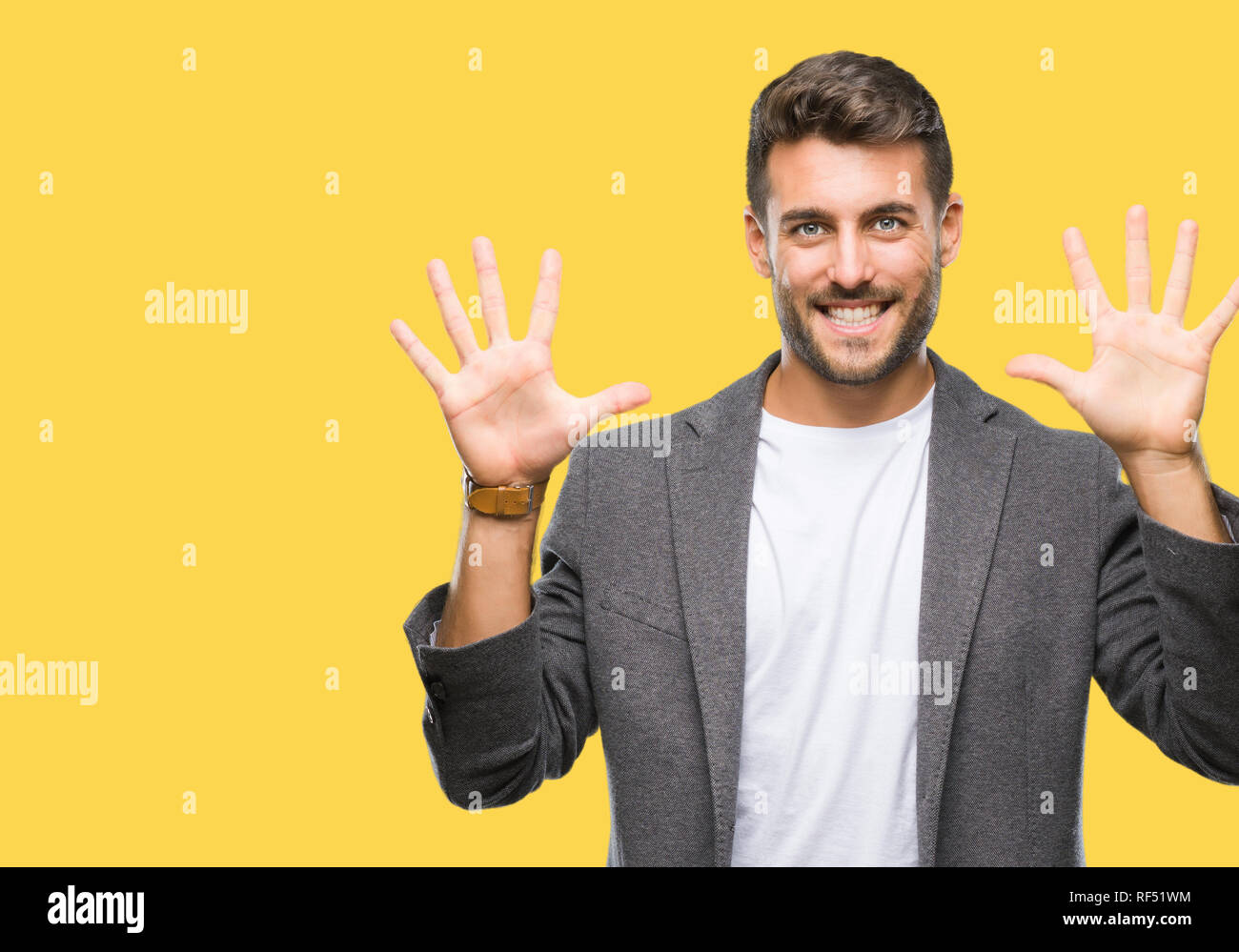 Young handsome business man over isolated background showing and ...