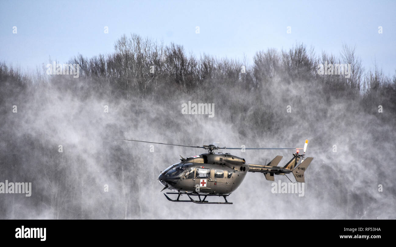 A Lakota helicopter creates blizzard like conditions as it maneuvers ...