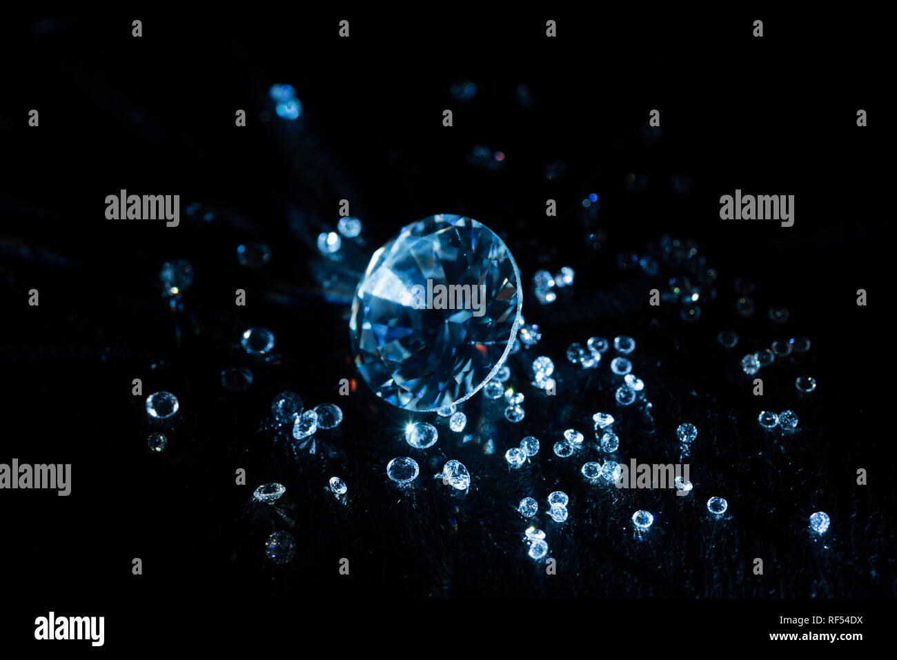 big and small transparent clear diamonds isolated on black Stock Photo ...