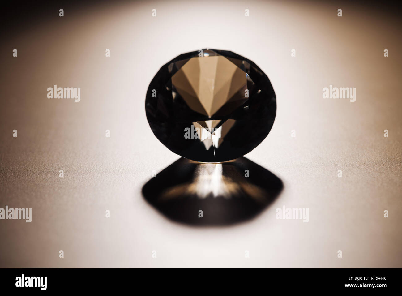 clear diamond with shadow on beige background Stock Photo - Alamy