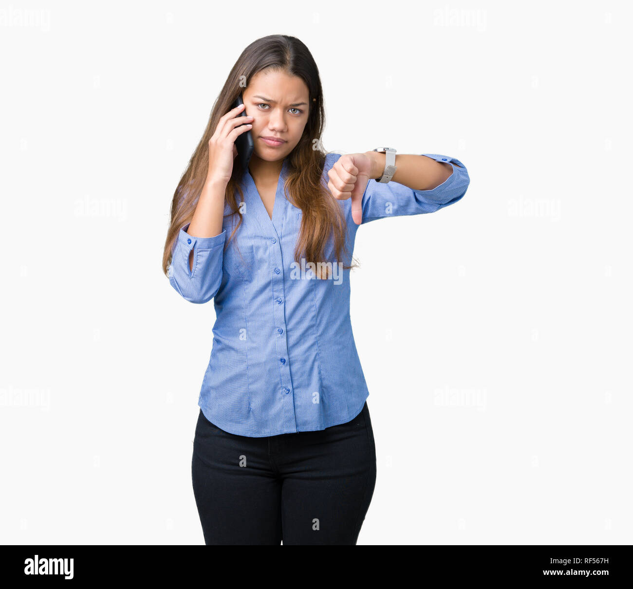 Young beautiful brunette business woman talking on smartphone over ...