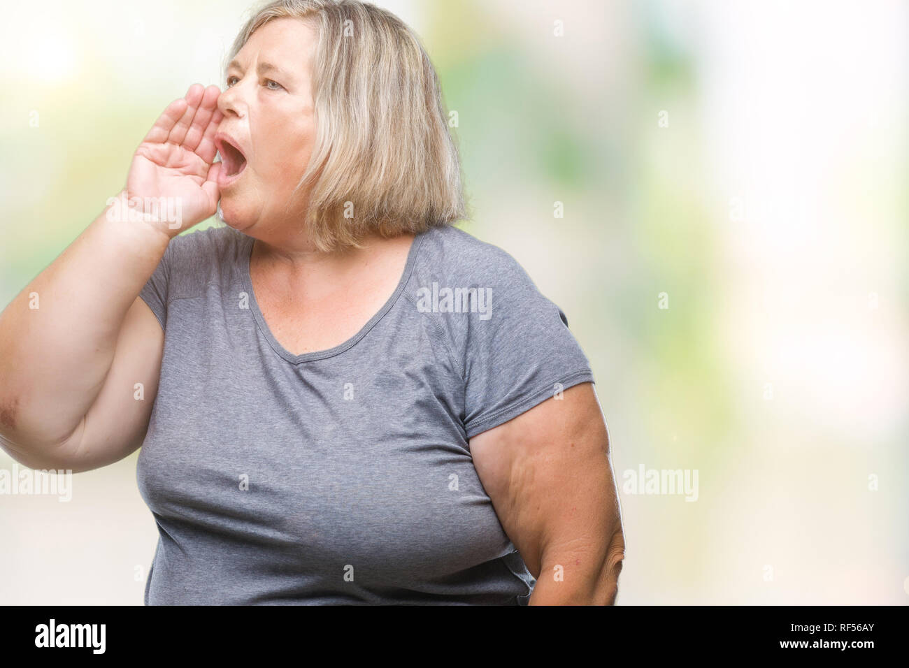 Senior plus size caucasian woman over isolated background shouting and ...