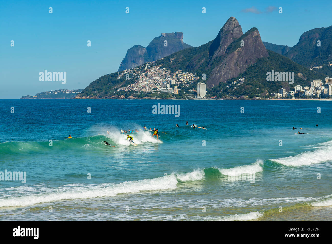 Surfers waiting for the perfect wave. Wonderful places in the world for ...