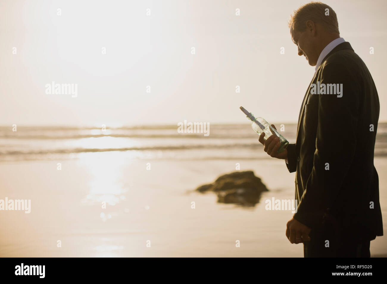 Image businessman holding message hi-res stock photography and images ...