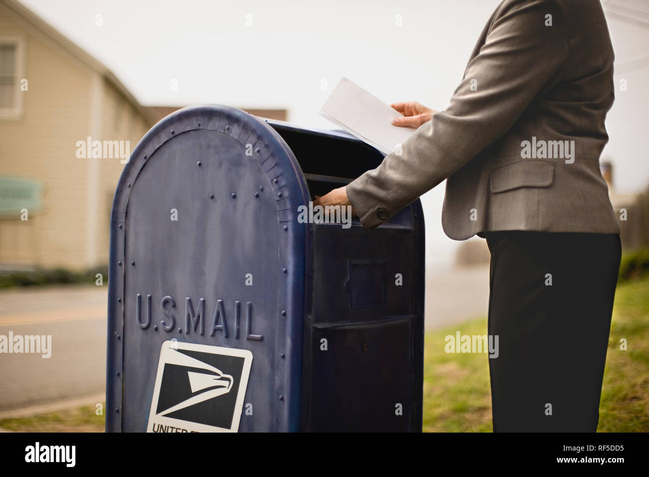 Woman boxes letters hi-res stock photography and images - Alamy