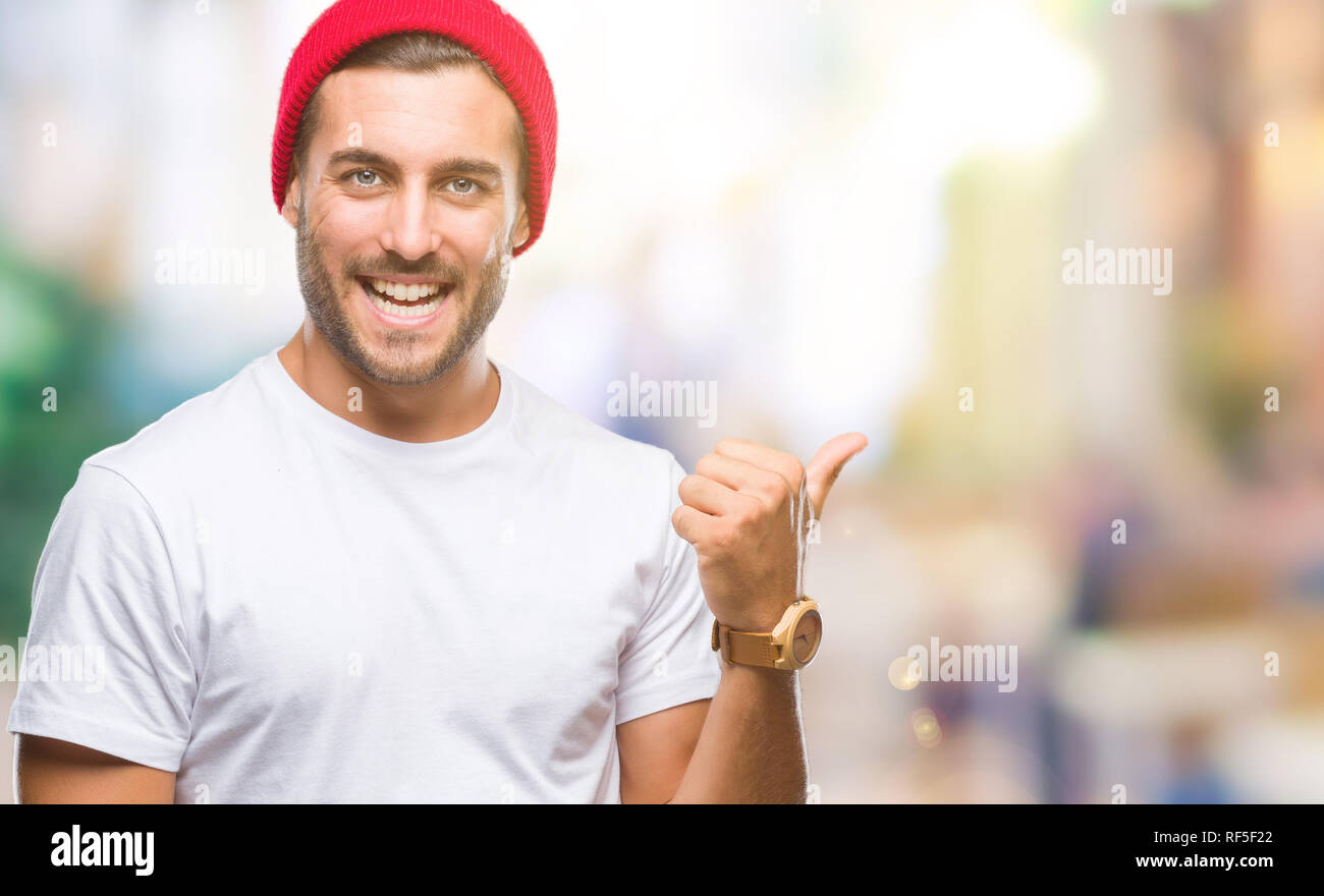 Young handsome man over isolated background smiling with happy face ...