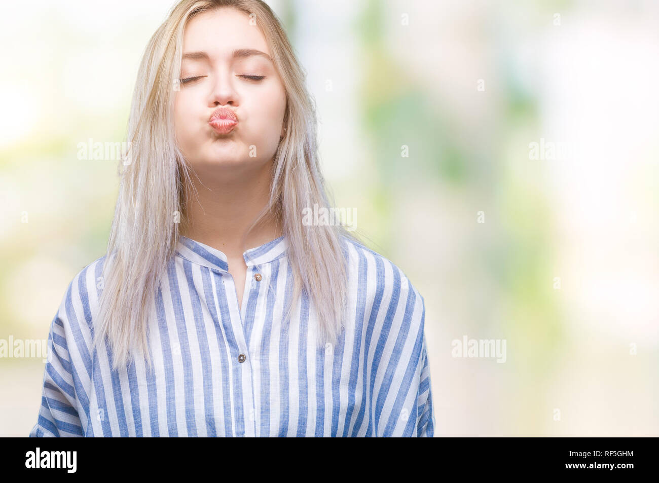 Puffed cheeks woman hi-res stock photography and images - Alamy