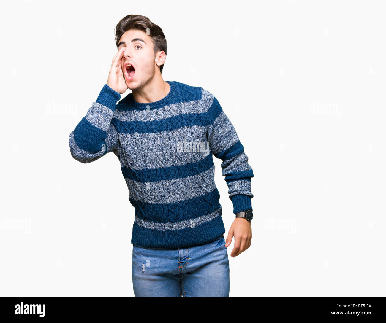 Young handsome man over isolated background shouting and screaming loud ...
