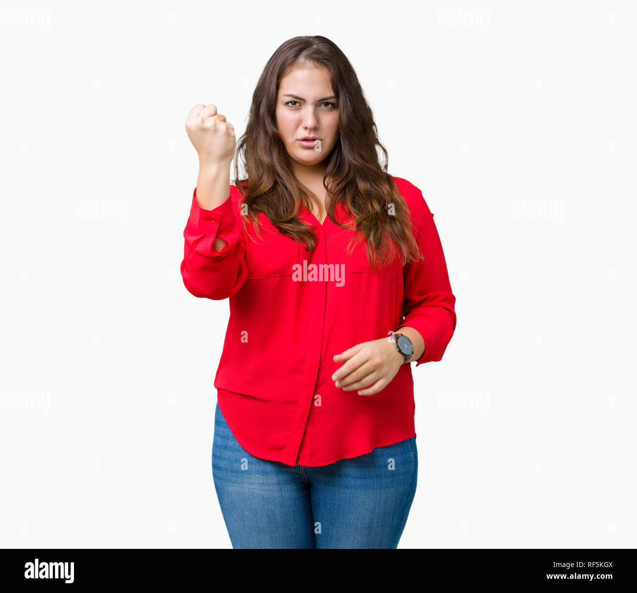Beautiful plus size young business woman over isolated background angry ...