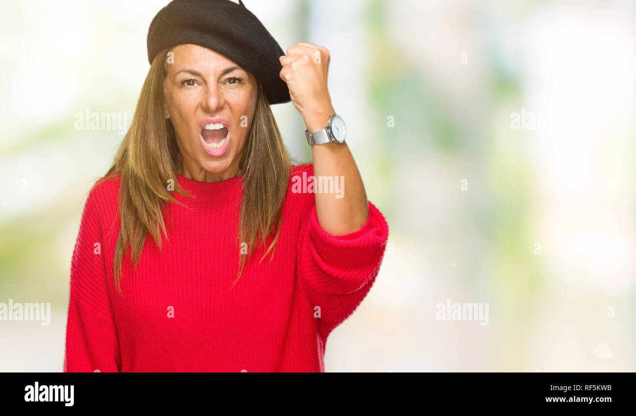 Middle age adult woman wearing fashion beret over isolated background ...