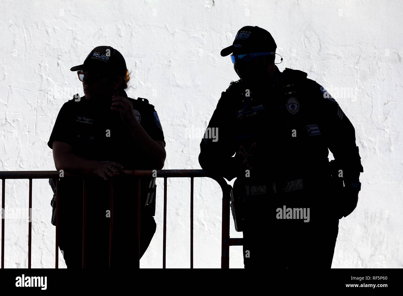 Police in silhouette, San Juan, Puerto Rico Stock Photo - Alamy