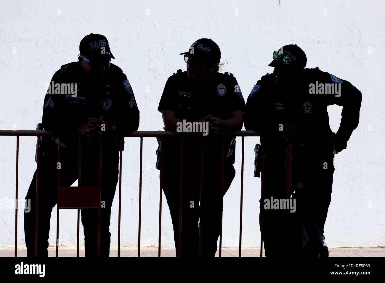 Police in silhouette, San Juan, Puerto Rico Stock Photo - Alamy