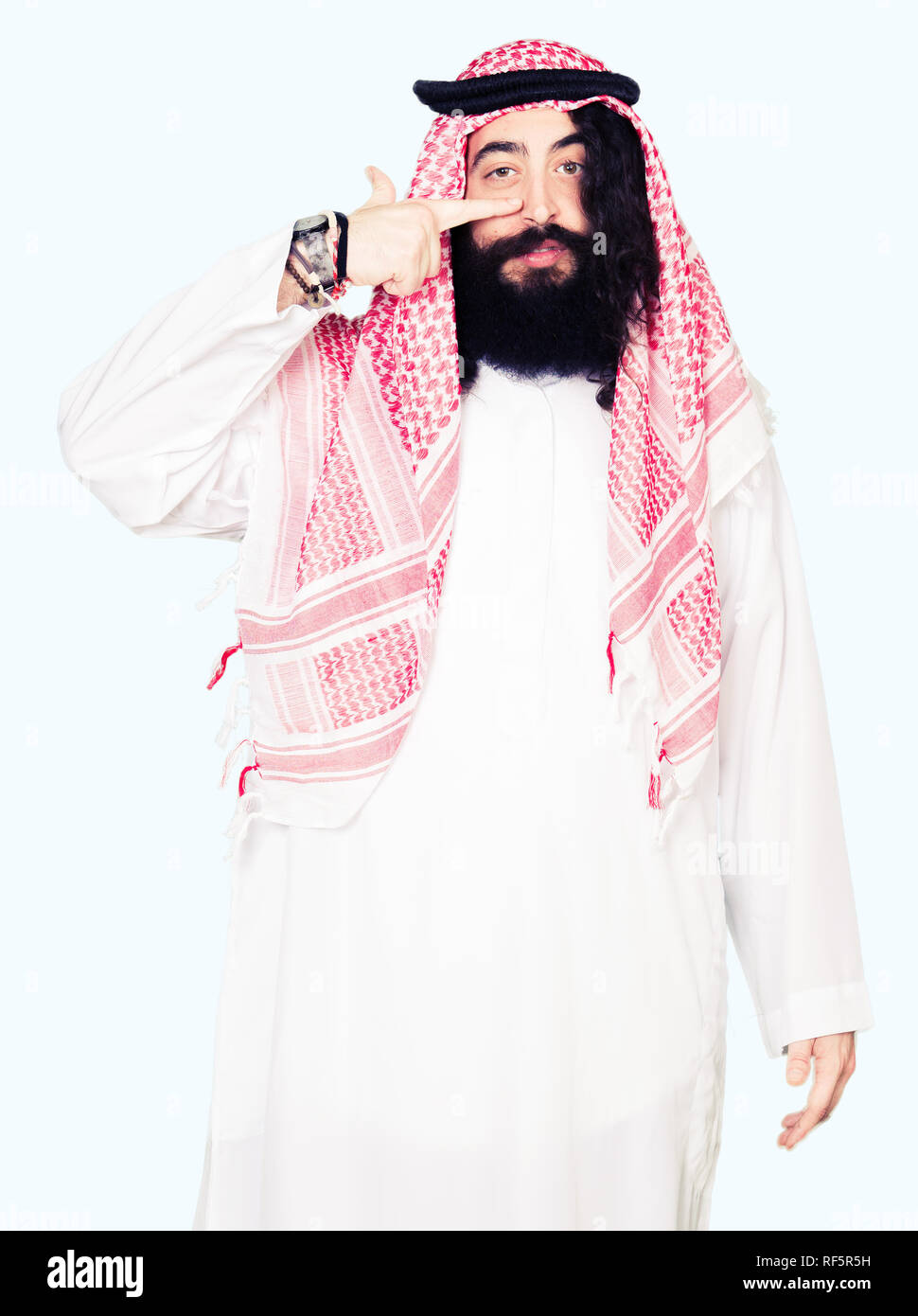 Arabian business man with long hair wearing traditional keffiyeh scarf ...