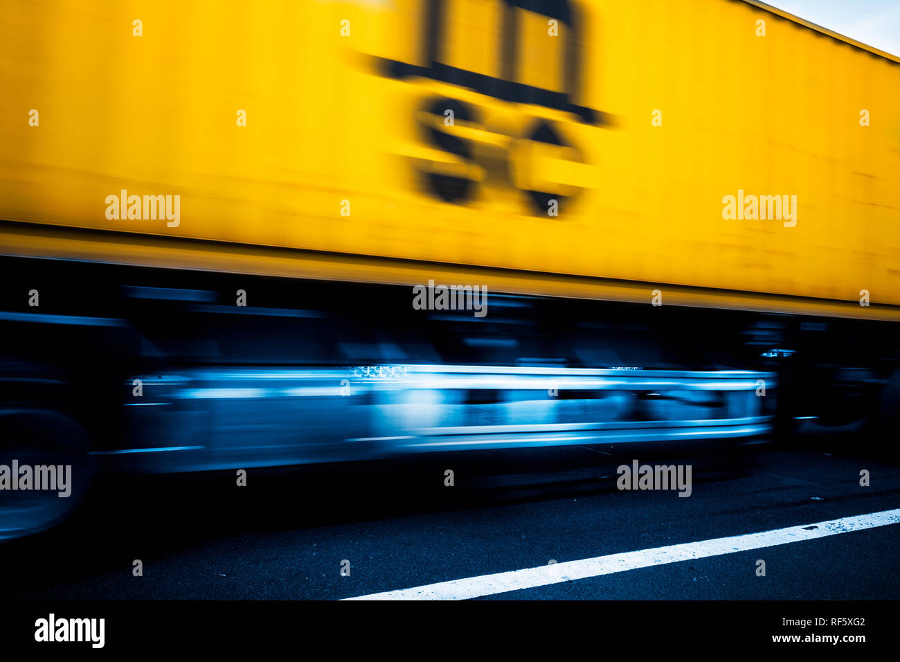 motion blurred truck on a highway/motorway/speedway Stock Photo - Alamy