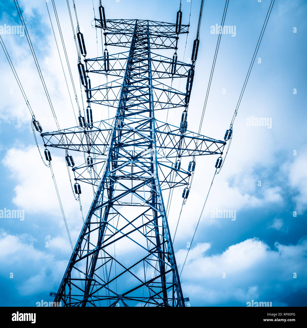 High voltage towers with sky background Stock Photo - Alamy