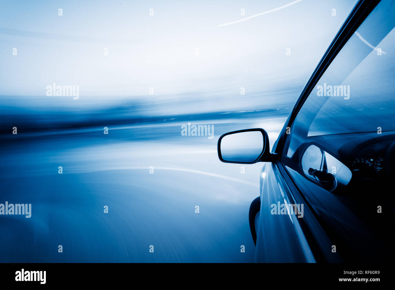 View from Side of Car Going Around Corner, Blurred Motion Stock Photo ...