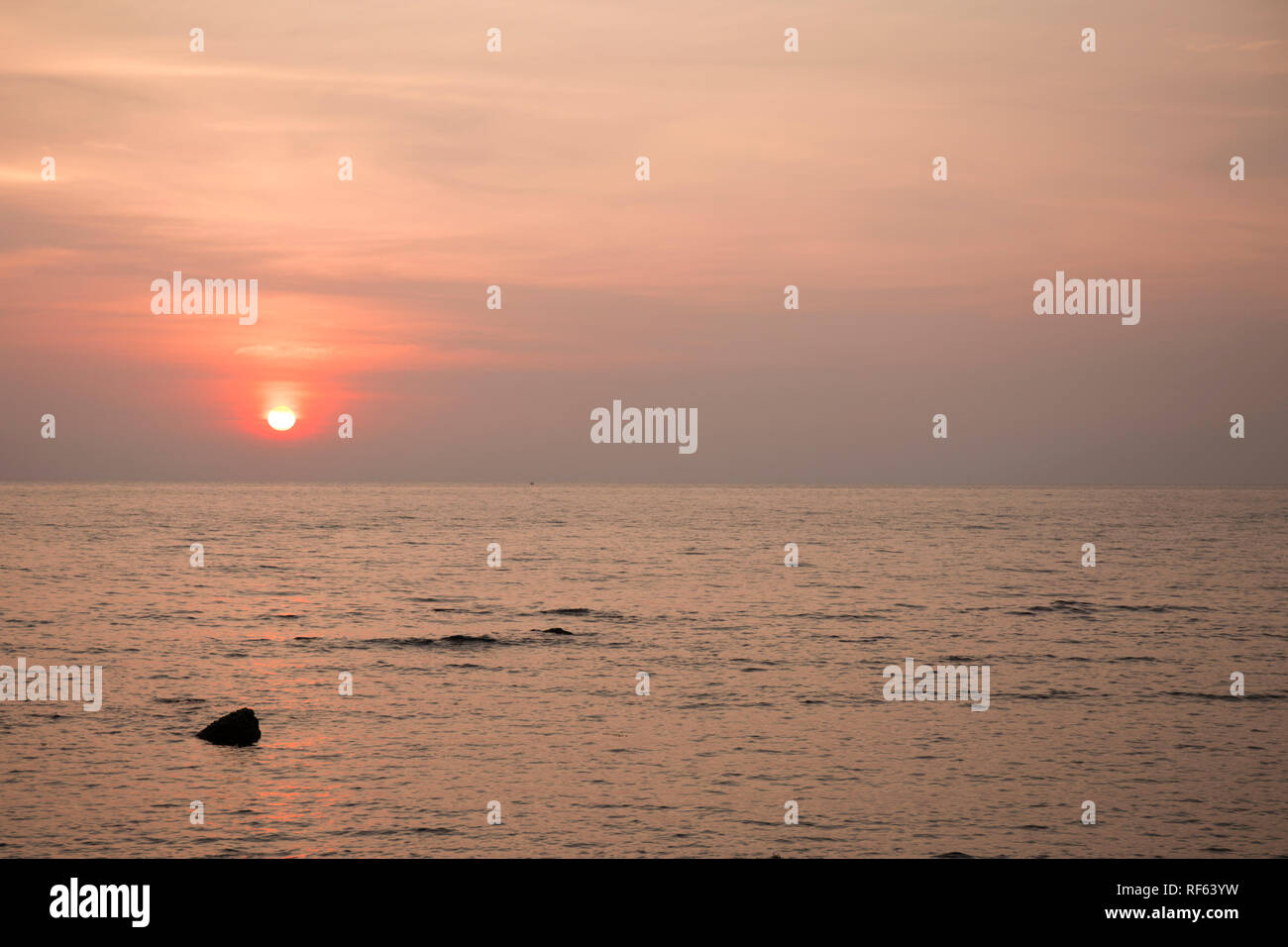 The sea sunset. Pink landscape Stock Photo - Alamy