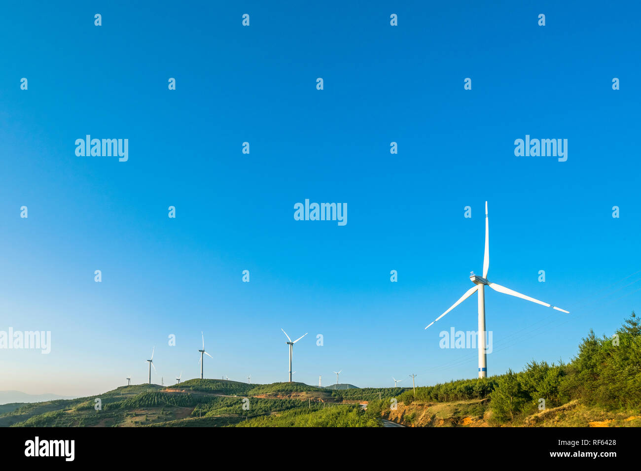 wind turbine on the top of mountain yunnan china Stock Photo - Alamy