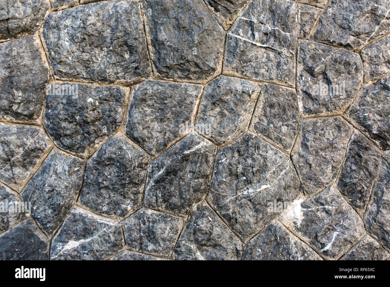 Old rough stone wall. Rock gray background Stock Photo - Alamy