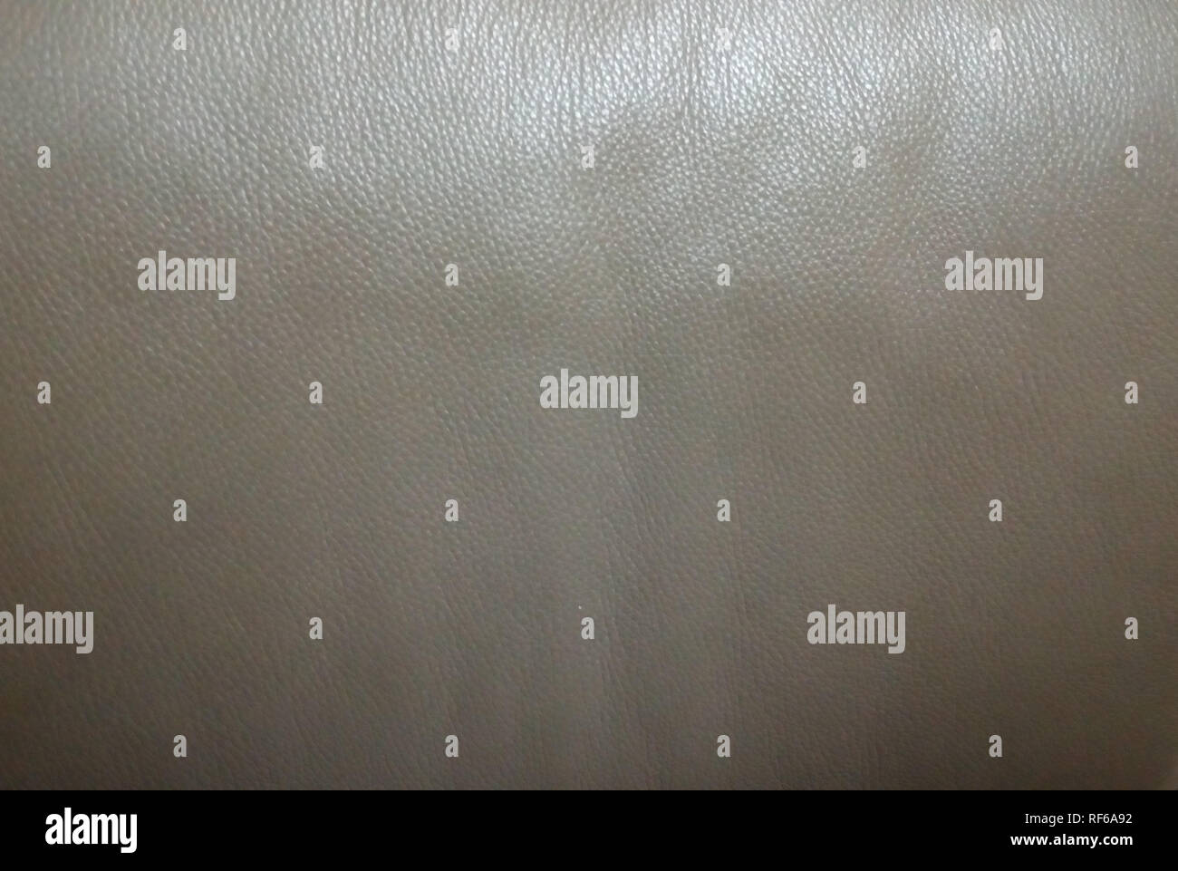 Natural dark beige leather close-up. Background. Texture. Close up shot ...