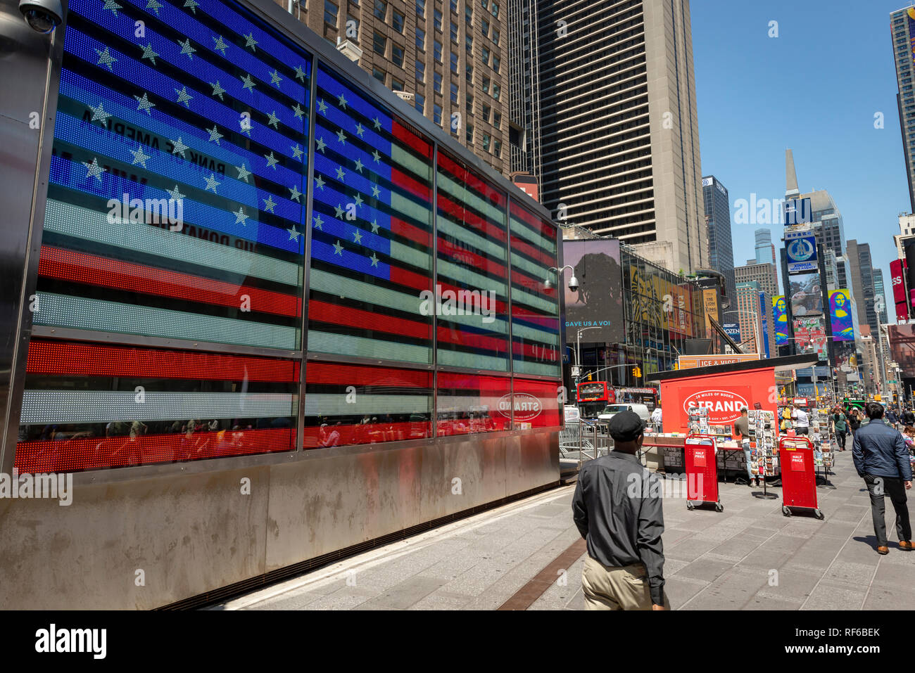 A large American Flag display on the side of the Armed Forces ...