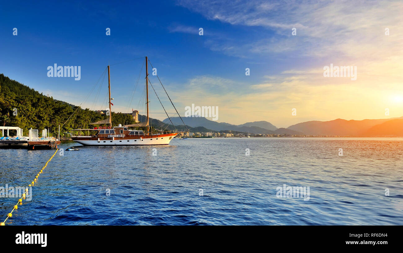 Calm bay with clear water and anchored sail boat. Turkey Stock Photo ...